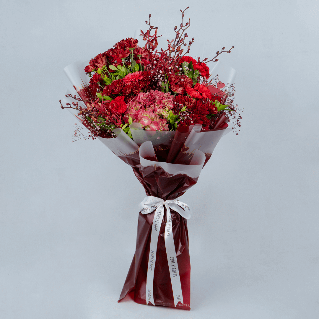 "The Red Woman " Valentines flower Bouquet | Order Now June Flowers
