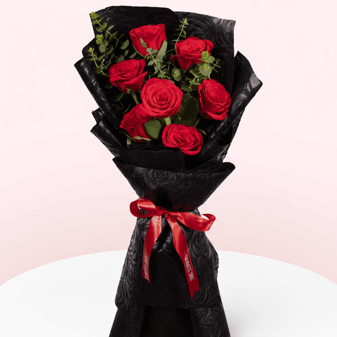 Order 7 Red Roses online with Eucalyptus in Bold Black Wrap